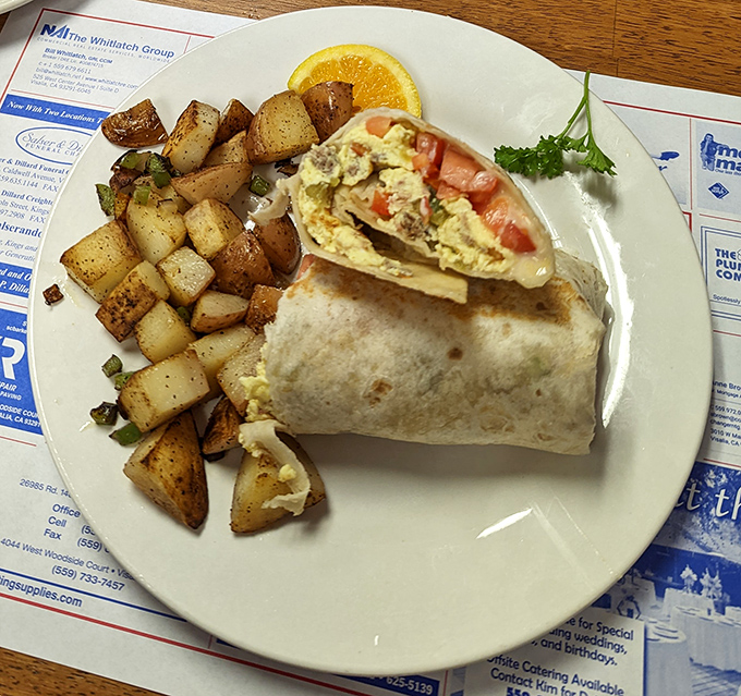 The breakfast burrito – where Danish tradition meets California morning cuisine. Those home fries look like they've achieved the perfect crisp-to-tender ratio that potato scientists dream about.