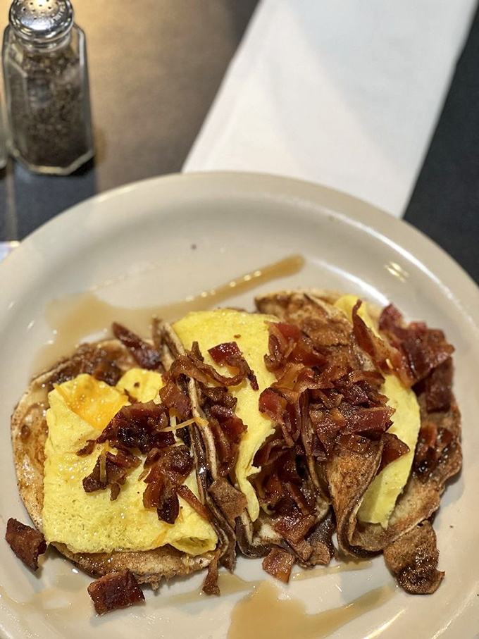 Breakfast tacos aren't just a meal&mdash;they're edible sunshine. Fluffy eggs and crispy bacon nestled in a tortilla create the perfect handheld happiness.