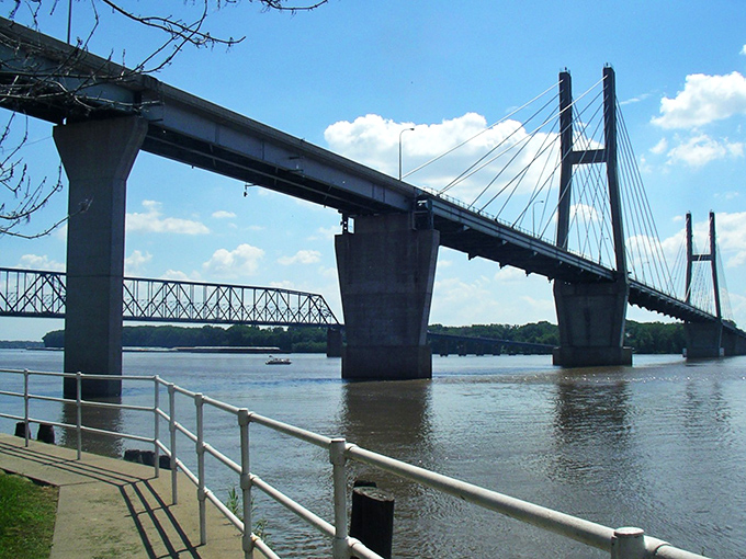 Quincy's bridge spans the mighty Mississippi like a steel handshake between Illinois and Missouri, offering postcard-worthy views for exactly zero dollars.