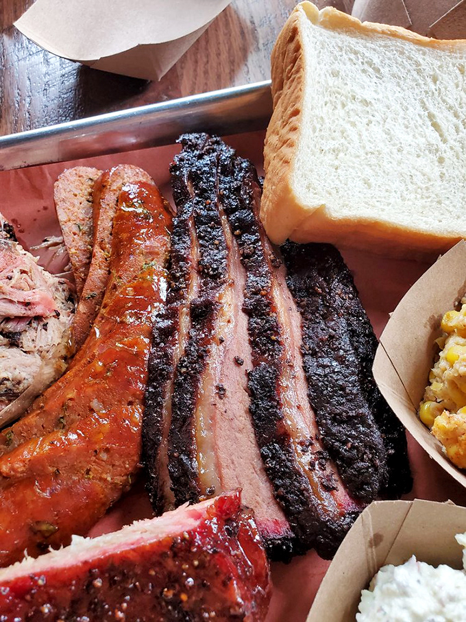 The barbecue board of your dreams. That pink smoke ring isn't makeup&mdash;it's a badge of honor earned through patience.