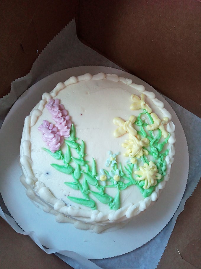 This cake's charming floral decorations might not win any Instagram awards, but its homespun authenticity speaks to a time before filters and followers.