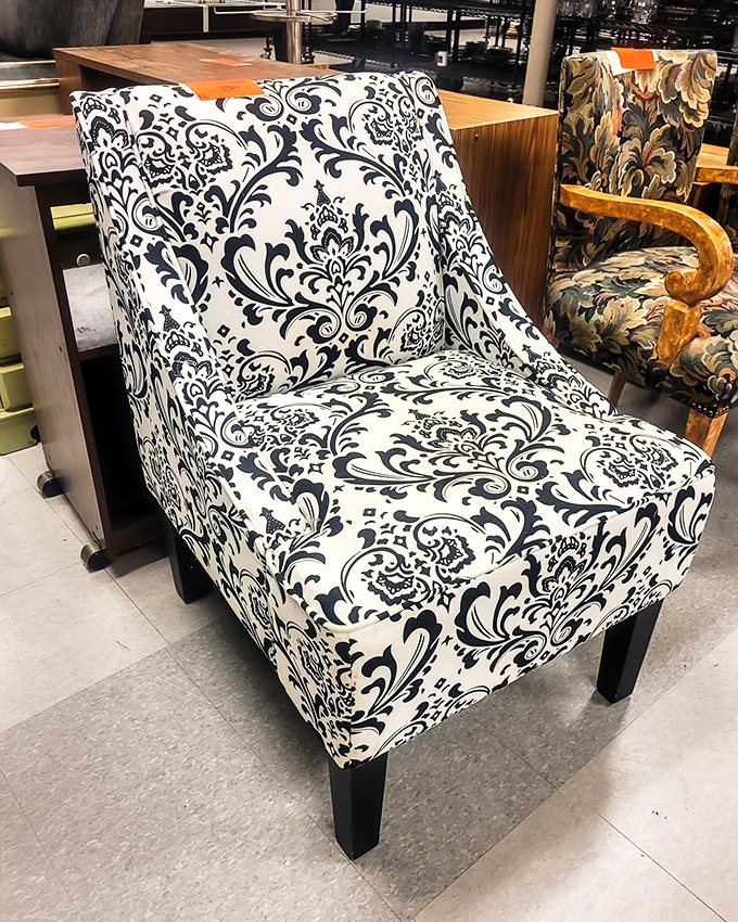 This patterned accent chair isn't just furniture&mdash;it's the statement piece your living room has been texting you about.