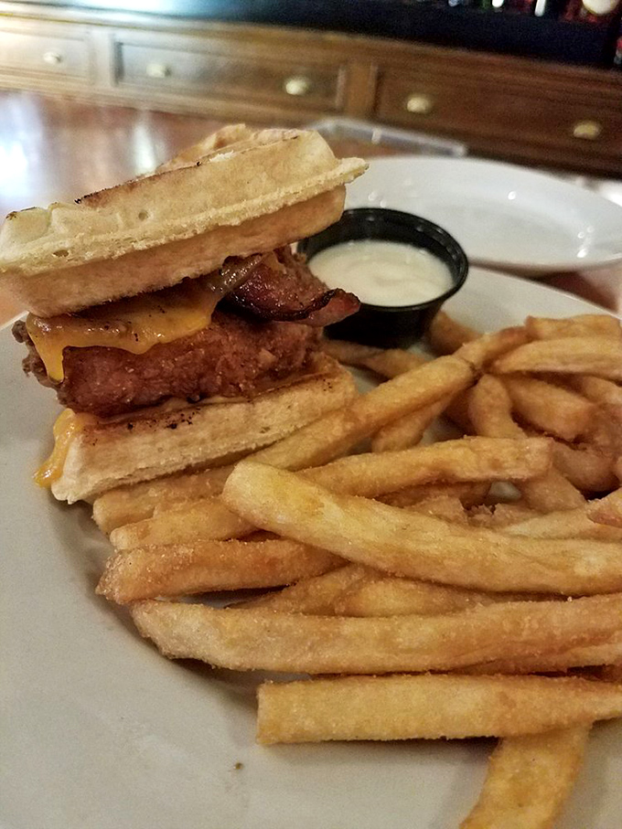 Whoever first decided to pair chicken with waffles deserves a Nobel Prize. This sweet-savory masterpiece makes breakfast jealous of dinner.