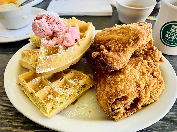 The chicken and waffle combo that launched a thousand food dreams. That strawberry butter melting on top is the plot twist you didn't know you needed.