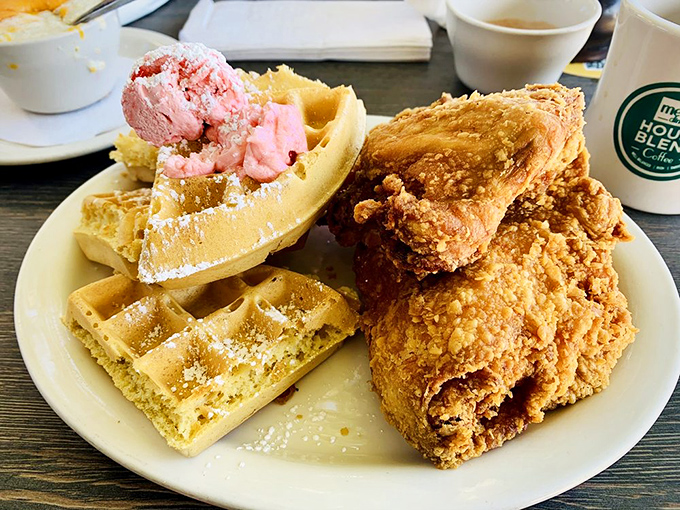 The chicken and waffle combo that launched a thousand food dreams. That strawberry butter melting on top is the plot twist you didn't know you needed.