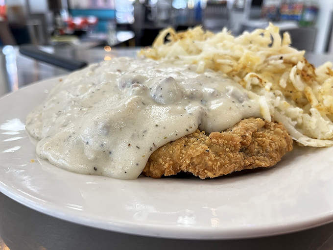 Country-fried steak smothered in gravy that your grandmother would approve of. The kind of dish that makes you want to invent a time machine just to eat it again.