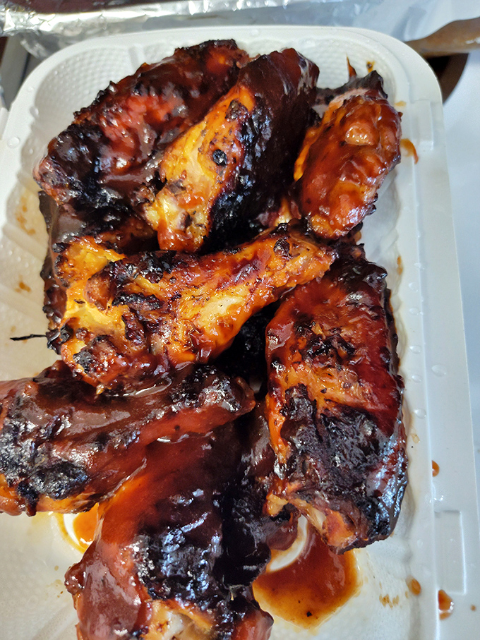 These aren't just wings; they're edible time machines transporting you to every great summer cookout you've ever experienced.