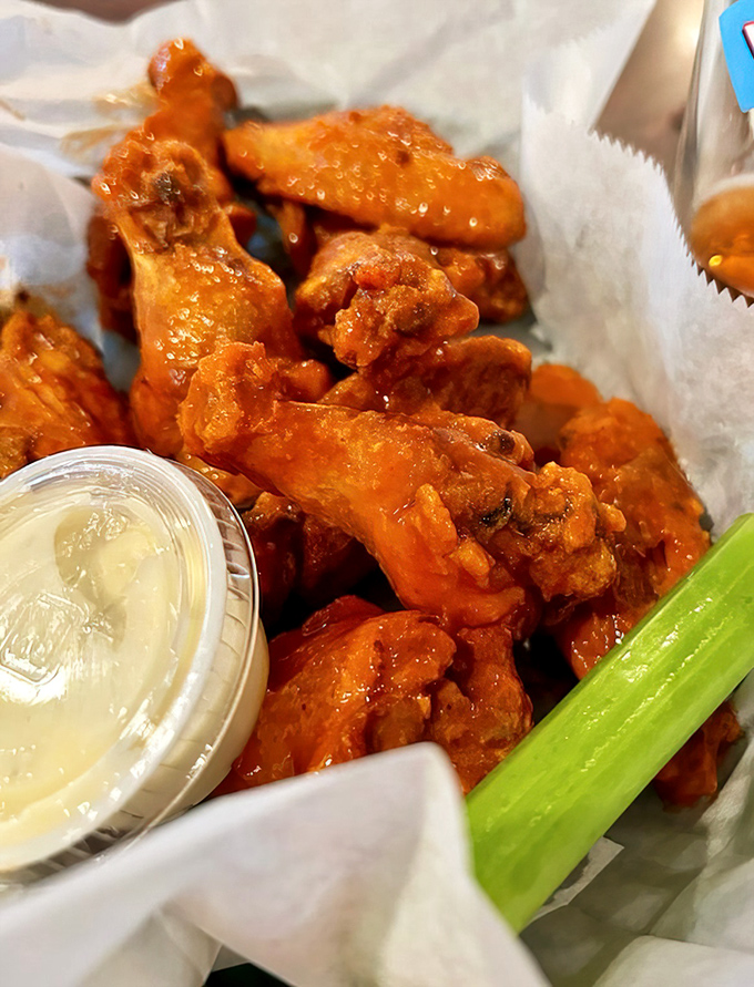 These wings aren't just crispy, they're having an identity crisis because they think they're potato chips. That sauce deserves its own fan club.
