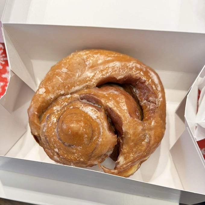 This isn't just a cinnamon roll &ndash; it's a spiral-shaped love letter to butter, sugar, and the art of morning indulgence.