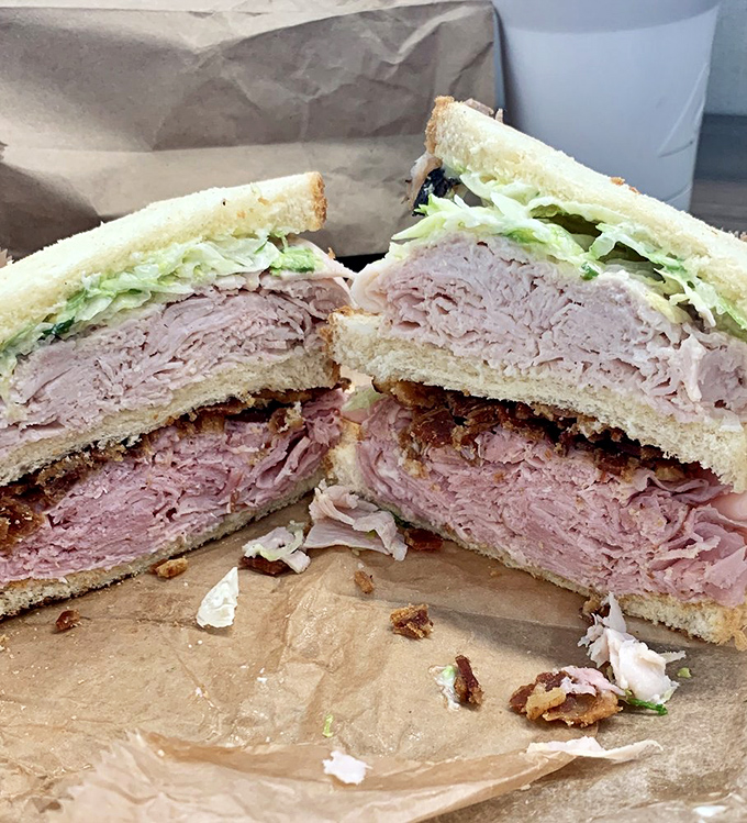 The club sandwich architecture should be studied in engineering schools&mdash;three perfectly stacked stories of meat, veggies, and toasted bread harmony.