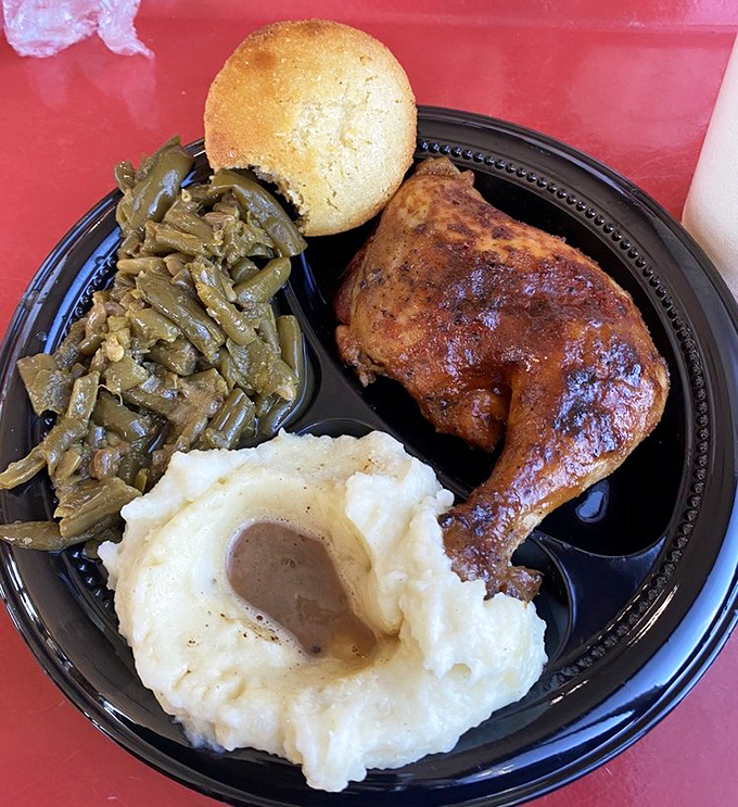 When mashed potatoes get their own gravy crater, you know someone understands portion control priorities.