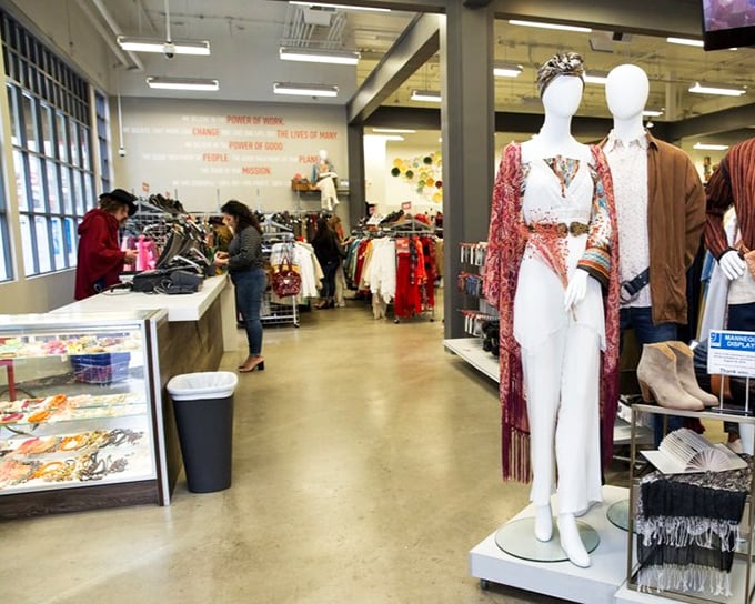 Mannequins showcase curated looks that prove secondhand doesn't mean second-rate in this thoughtfully organized shopping space.