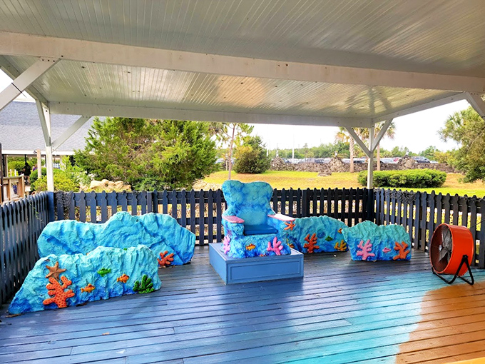 Ocean-themed seating area where you can rest your fins between adventures. These wave-inspired benches are what I imagine mermaids have in their living rooms.