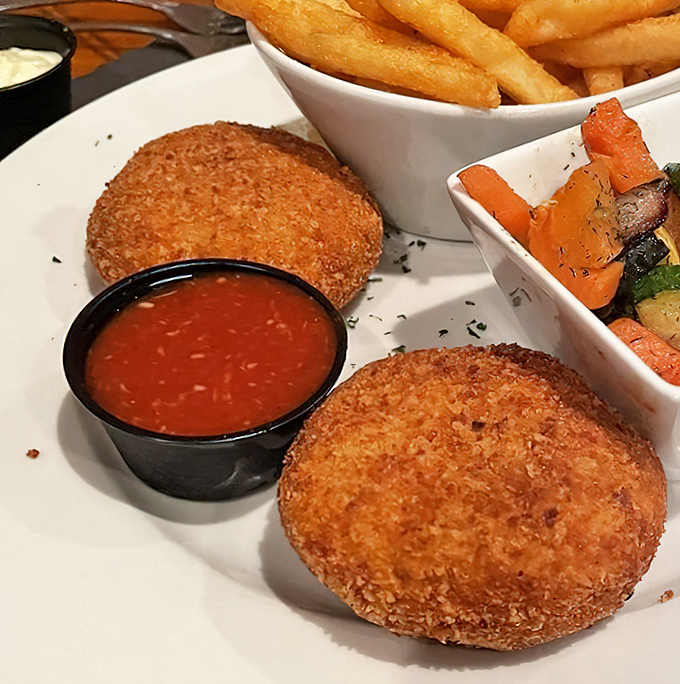 Golden-brown crab cakes that don't hide behind fillers&mdash;just pure, luscious crabmeat waiting to meet its destiny with your taste buds.