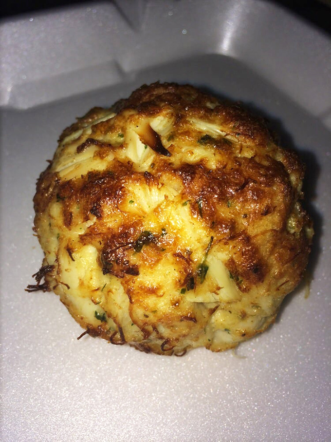 Behold the crab cake that launched a thousand return visits, crispy outside and packed with sweet Bay treasures.