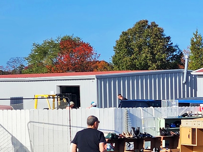 Shoppers explore treasures under the bright autumn sky at New Life Thrift Shop where unique finds bring charm to every visit.