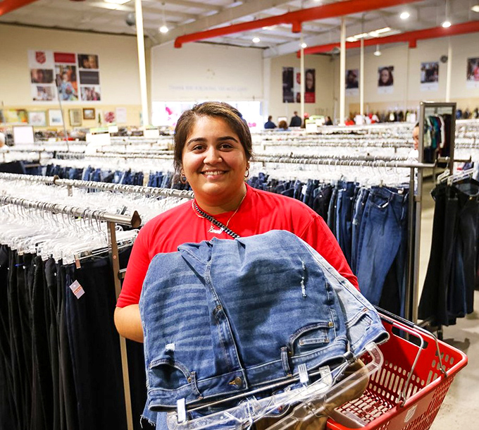 The joy of thrift store victory is universal! Those jeans will find new life and new adventures with their next owner.
