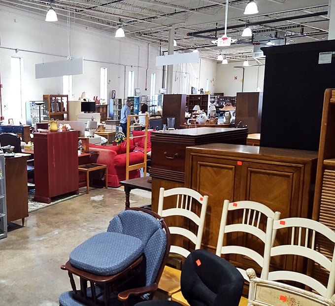 The furniture section resembles a living room United Nations—styles from every era peacefully coexisting under fluorescent lights.
