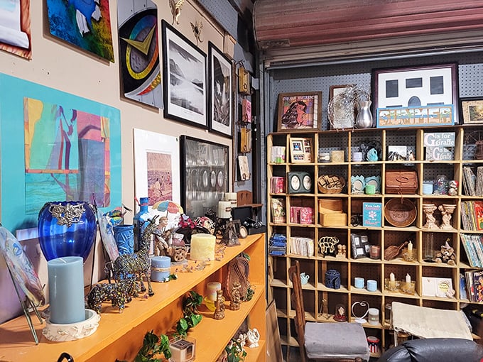 Curated chaos at its finest! This artisan's booth transforms everyday objects into conversation pieces that would make any interior designer nod approvingly.