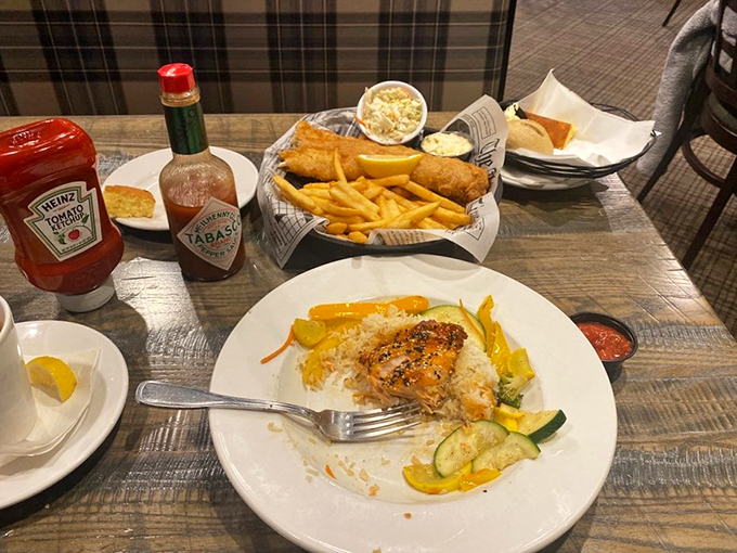 A plate that celebrates simplicity: perfectly cooked fish alongside golden fries and fresh vegetables&mdash;no foam or fancy drizzles required.