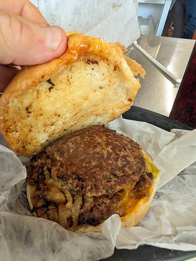 Behold the star of the show &ndash; a burger that doesn't need Instagram filters or fancy names, just honest beef, melted cheese, and a perfectly toasted bun.