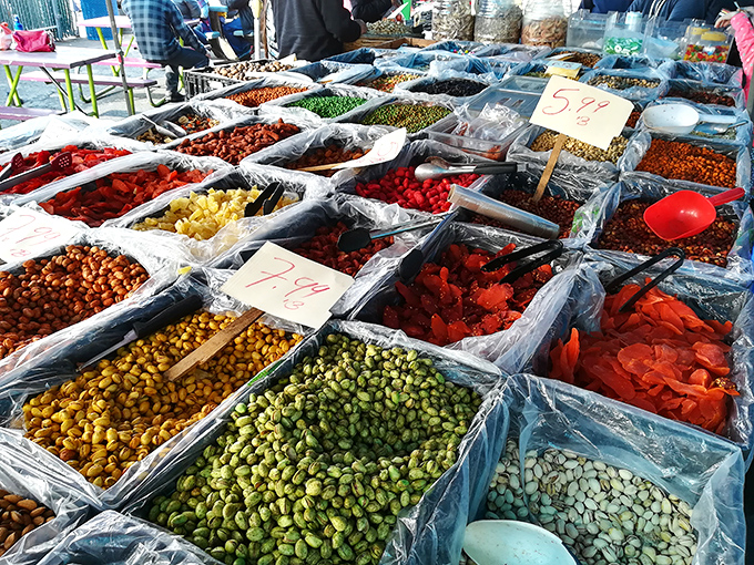 A kaleidoscope of dried delights awaits the snack enthusiast. Who knew nuts and fruits could create such an artistic display?