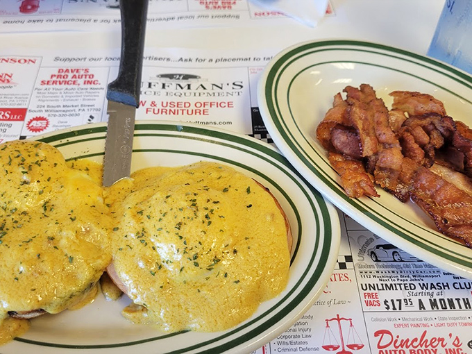 This isn't just an omelet&mdash;it's a golden envelope of breakfast joy, delivering cheese and herbs alongside crispy bacon that means business.
