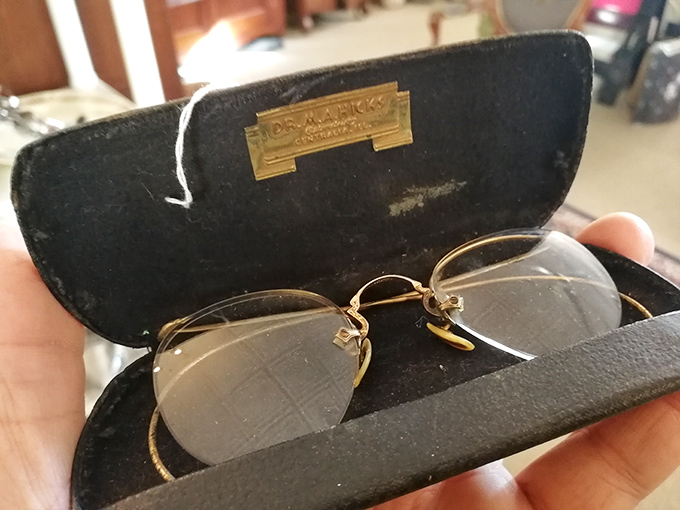 These gold-rimmed spectacles once helped someone see the world. Now they're artifacts waiting to tell their story to a new owner.