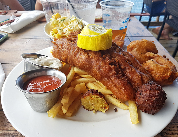 The fish and chips platter arrives like a golden tribute to the sea&mdash;crispy, flaky, and ready for its close-up on your Instagram feed.