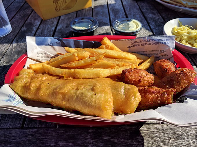 Golden-battered perfection that makes British fish and chips look like they need a passport upgrade.