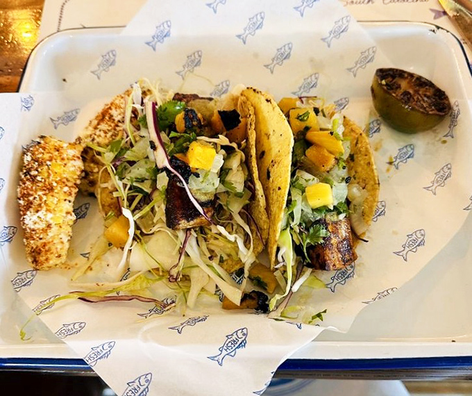 These swordfish tacos aren't just a meal; they're a flavor fiesta where mango salsa and fresh cabbage dance together in perfect harmony.