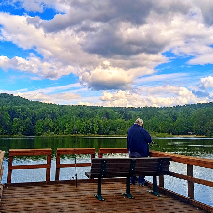 Solitude comes standard with this lakeside fishing spot. The bench practically begs for someone to sit, cast a line, and forget what day of the week it is.