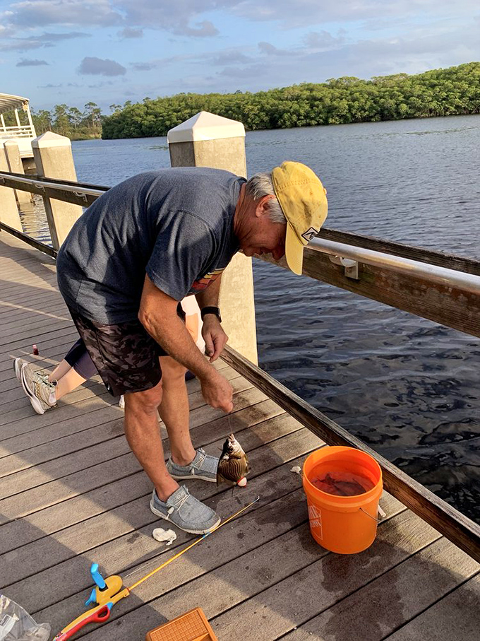 The patient fisherman knows: sometimes the best catch of the day isn't the fish, but the peaceful moments between bites.