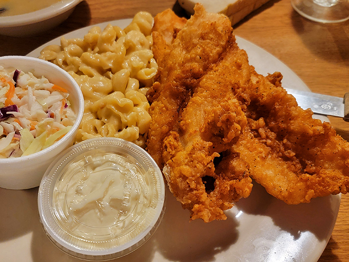 Golden-fried fish that would make a New Englander question their loyalty. Paired with creamy mac and cheese that's worth every calorie.