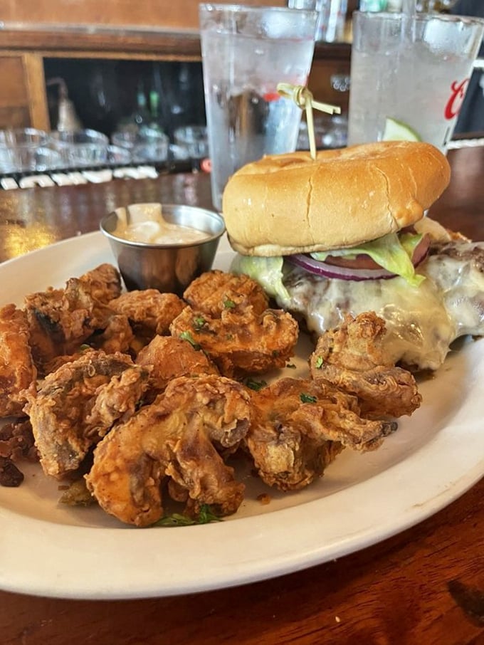 Crispy on the outside, tender within&mdash;these aren't your average bar bites. The fried chicken and burger combo delivers a one-two punch of satisfaction.