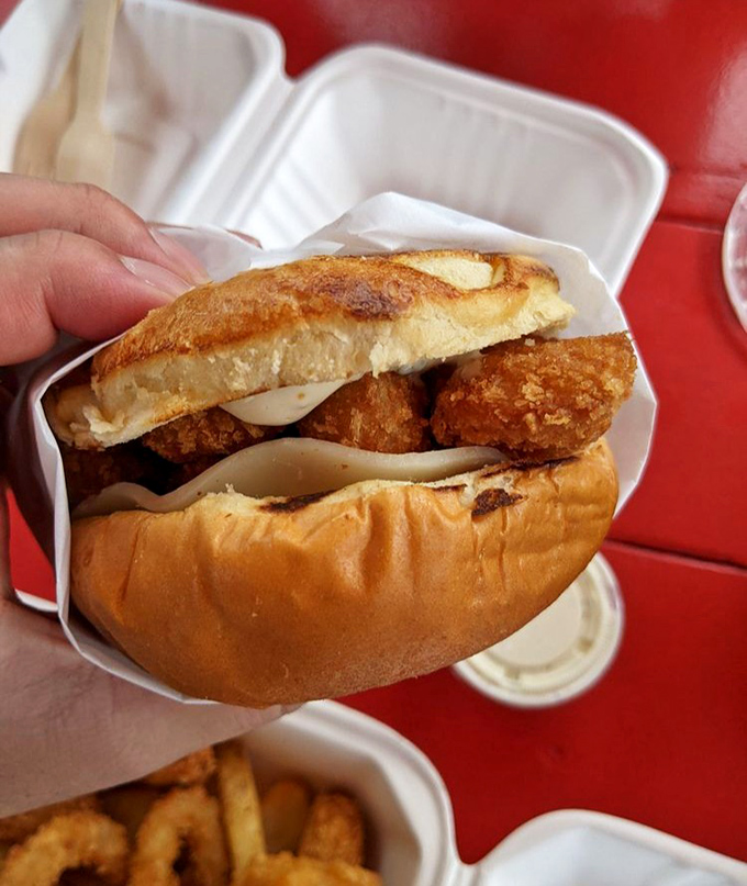 The fish sandwich &ndash; where perfectly fried seafood meets pillowy bread. A handheld ocean of flavor that makes fast food fish filets weep with inadequacy.