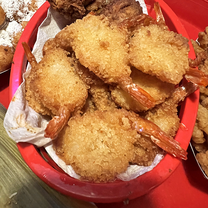 Golden-battered shrimp that crunch like nature's perfect potato chip. The kind of fried goodness that makes cardiologists weep.