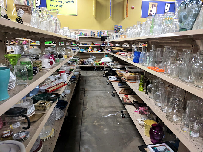 Glassware alley: where vintage Pyrex and modern mugs coexist in beautiful harmony. Your grandmother's kitchen and your Pinterest board collide here.