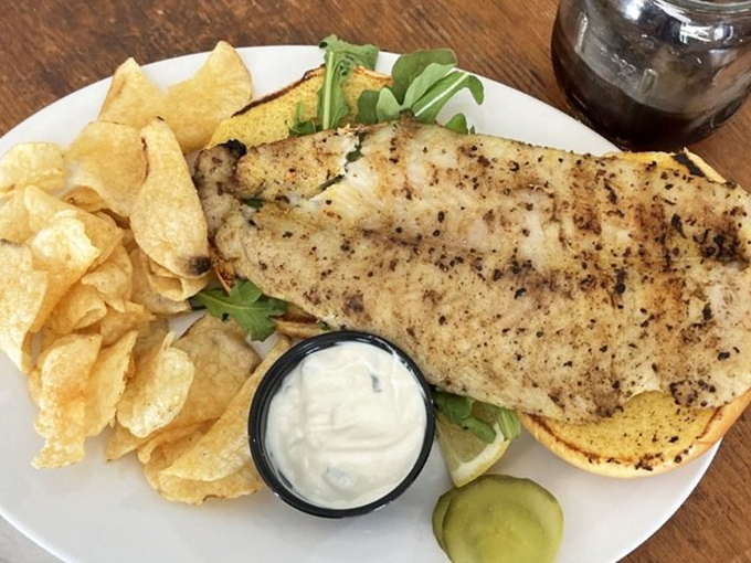 This grilled catfish sandwich isn't trying to be fancy&mdash;it's just being its best self. The chips aren't a side; they're loyal companions.