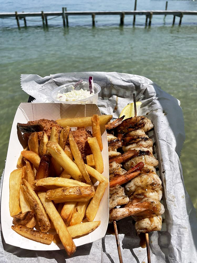 Harbor views make everything taste better, especially when "everything" is perfectly grilled Gulf shrimp and hand-cut fries.