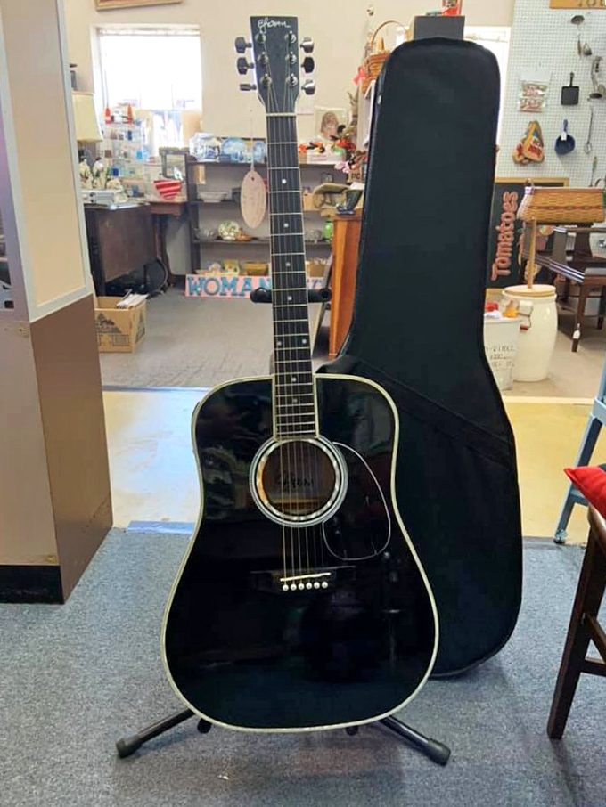 This black beauty isn't just a guitar&mdash;it's someone's abandoned rock star dreams waiting for a second act in your living room.