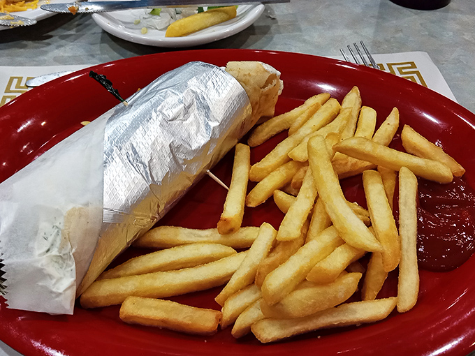 When your sandwich needs a silver outfit and an entourage of golden fries, you know you're in for a proper meal.