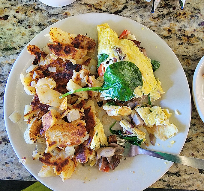 The infamous home fries&mdash;crispy on the outside, tender within. These potato masterpieces have probably prevented several local divorces.