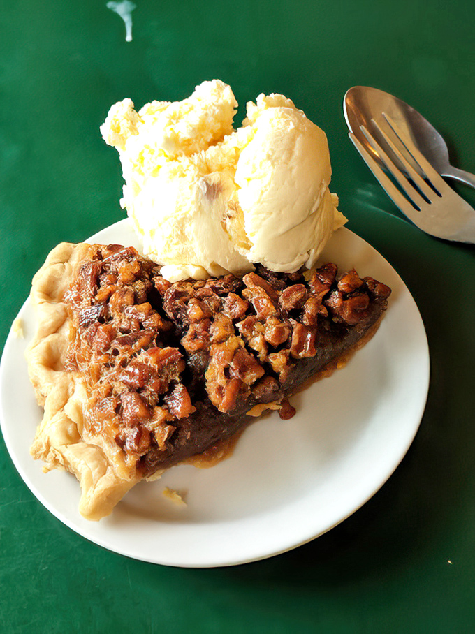 Pecan pie that would make your grandmother both jealous and proud, served with ice cream scoops generous enough to make you question all your life choices.