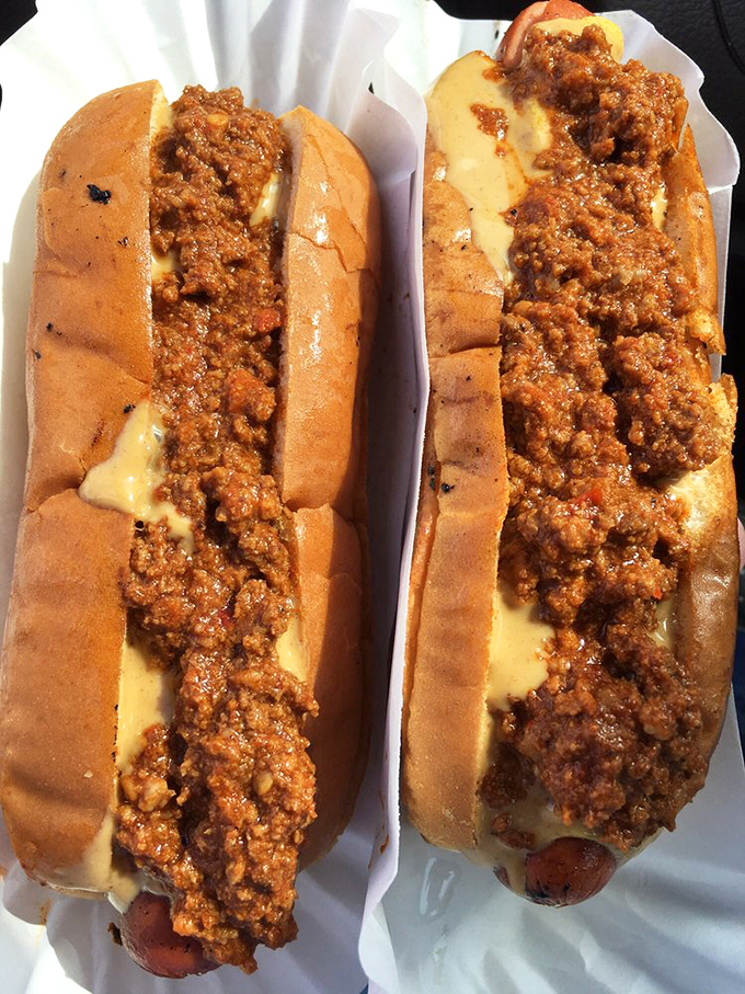 Two chili-covered beauties proving that sometimes more is definitely more when it comes to toppings.