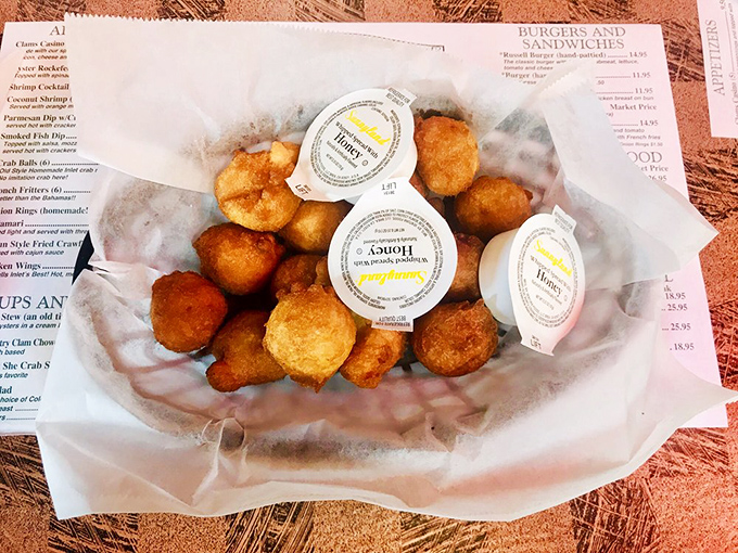 Golden-brown hushpuppies that could make a Southern grandmother weep with joy. Crispy outside, fluffy inside, and utterly irresistible all around.