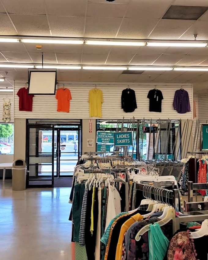 Color-coded clothing creates a rainbow road of fashion possibilities. The thrift store equivalent of following the yellow brick road to style.