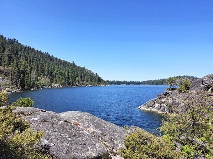 Mother Nature showing off again with this pristine alpine lake. No Instagram filter required &ndash; this is pure Sierra Nevada magic.