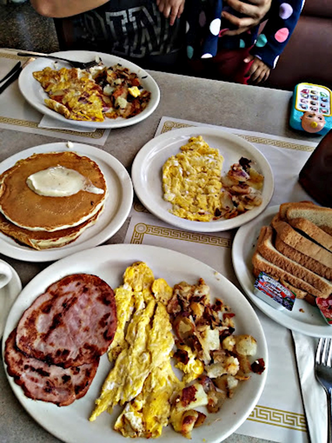 The breakfast spread that launched a thousand food comas. Those pancakes aren't just a meal&mdash;they're an edible security blanket.