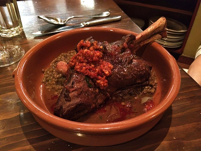 This lamb shank isn't just fall-off-the-bone tender—it practically leaps off the bone and does a victory dance on your taste buds. Pure Abruzzese comfort.